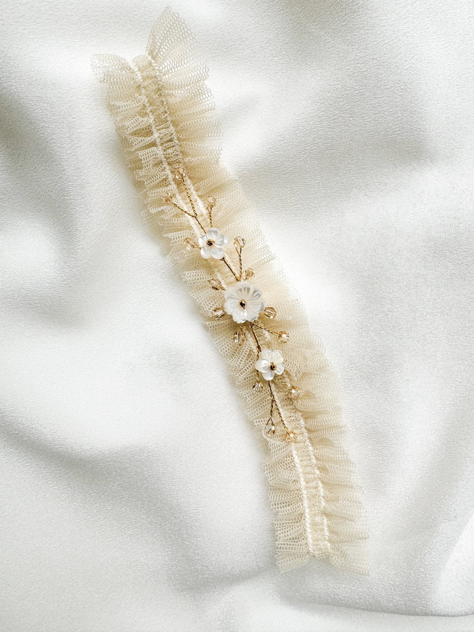Elegant ivory cream garters with crystal or floral jewel embellishment ...