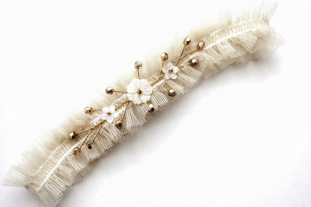 Elegant ivory cream garters with crystal or floral jewel embellishment ...