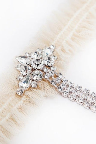 Elegant ivory cream garters with crystal or floral jewel embellishment ...